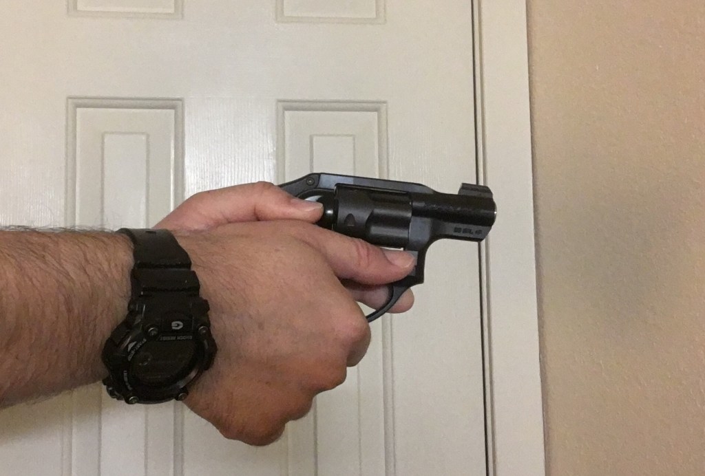 Thumbs Forward Grip with a Revolver – Reflex Handgun